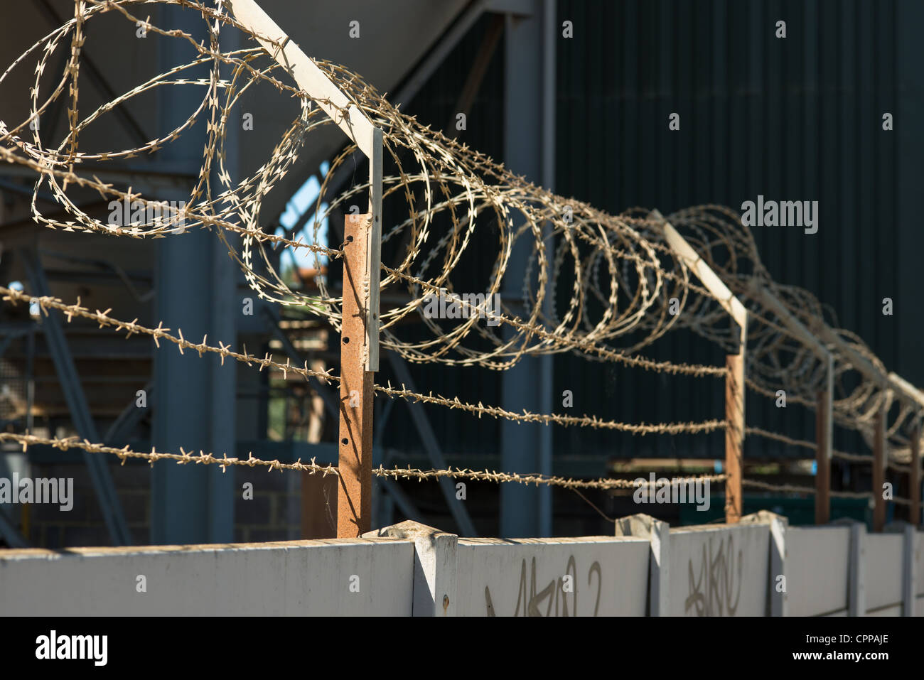 Barbed wire coil hi-res stock photography and images - Alamy