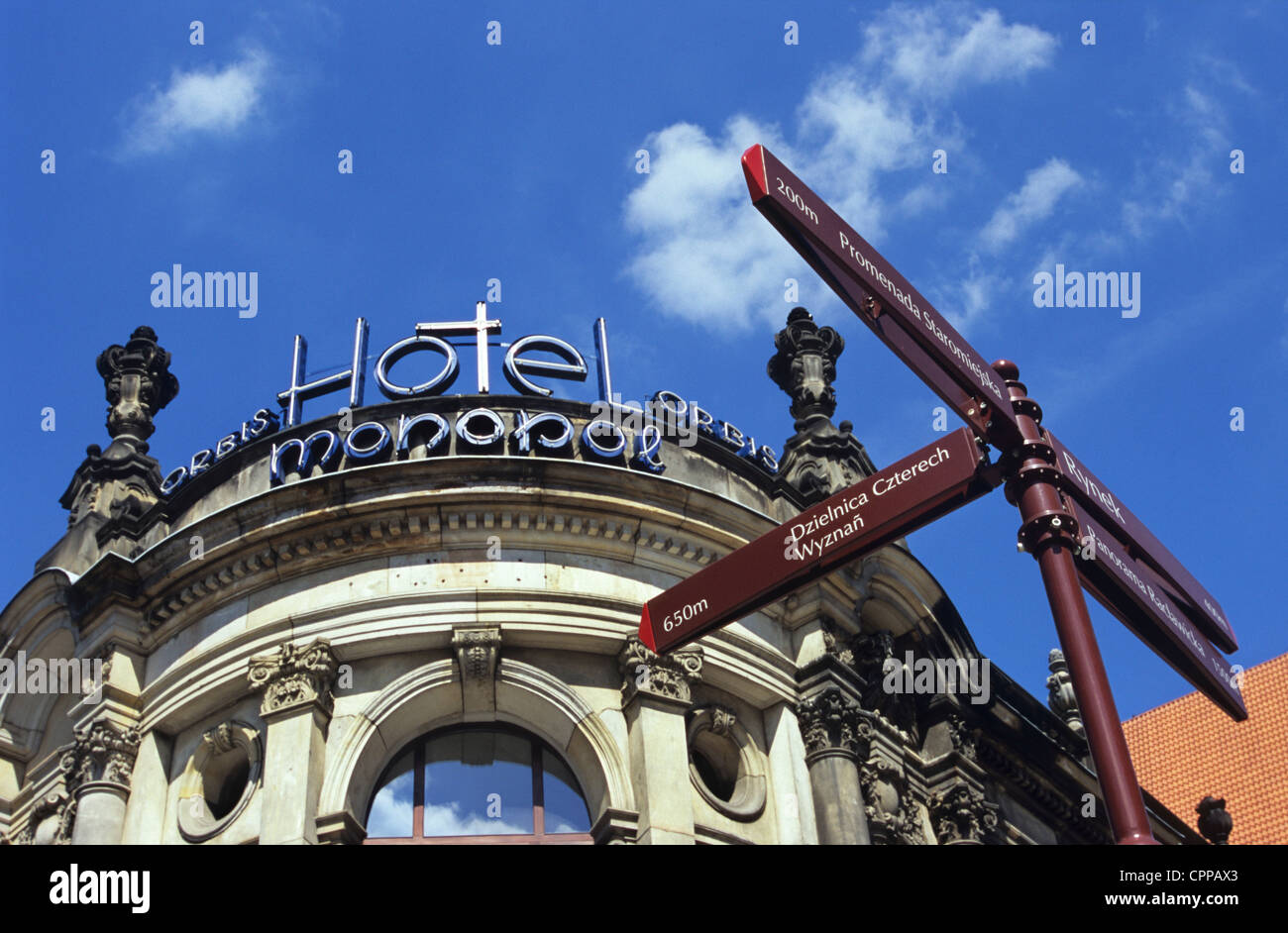 Hotel Monopol and a sign with directions, Wroclaw, Poland Stock Photo ...
