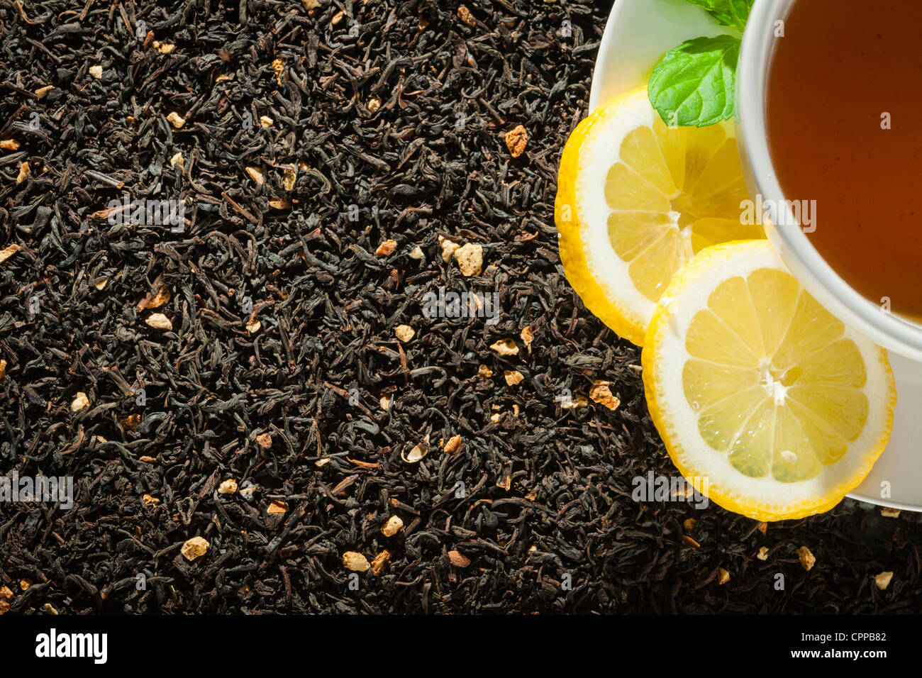 White cup of tea with slices of lemon Stock Photo - Alamy