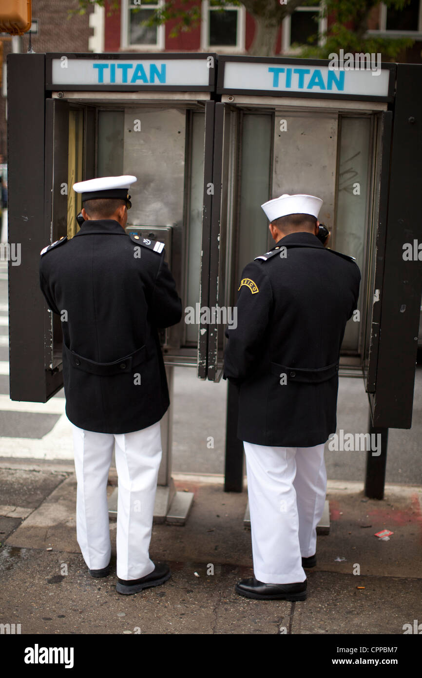 Mexican sailors use pay phones along Court Street in Brooklyn, New York ...