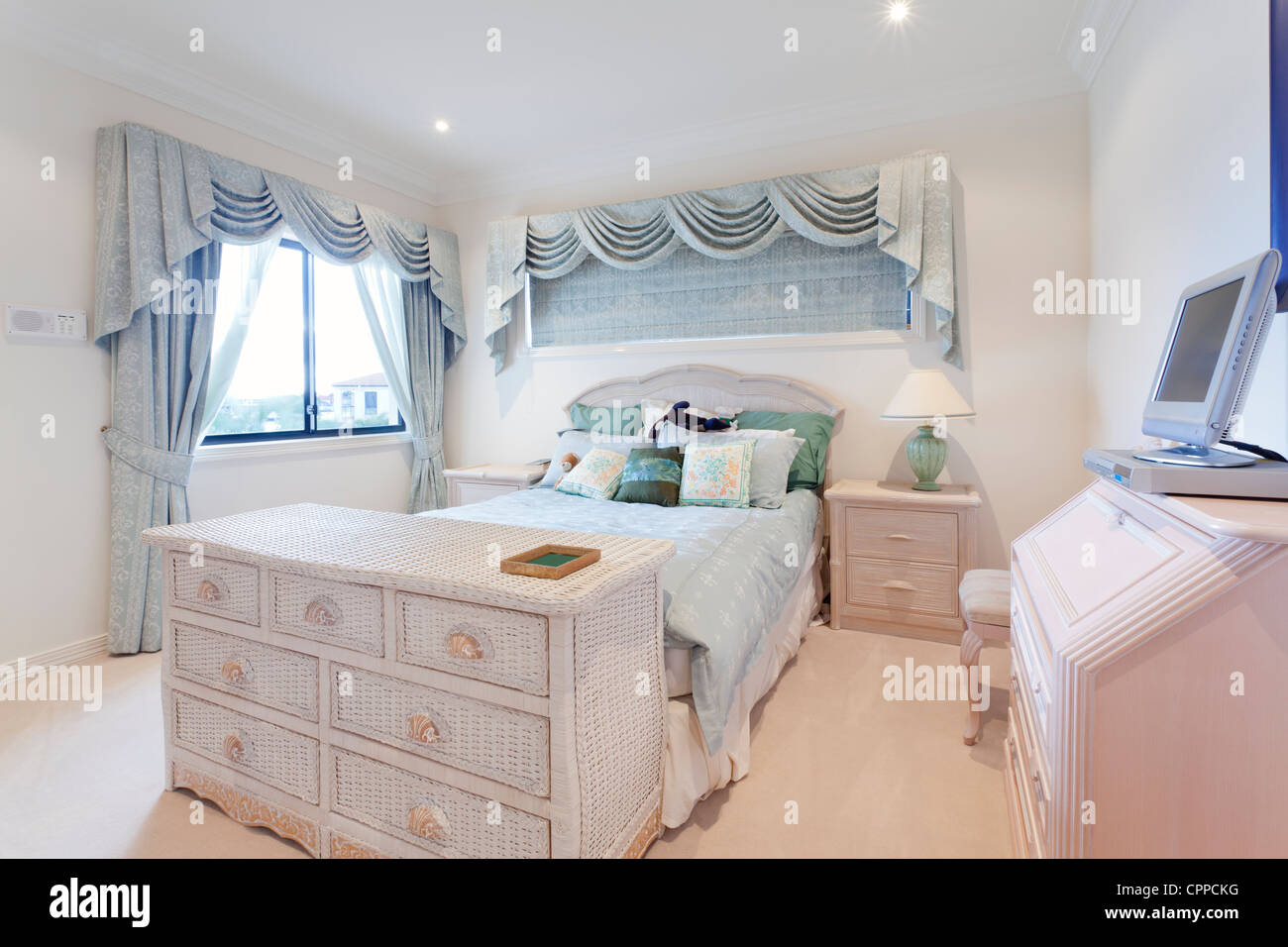 Stylish white bedroom in luxury house Stock Photo - Alamy