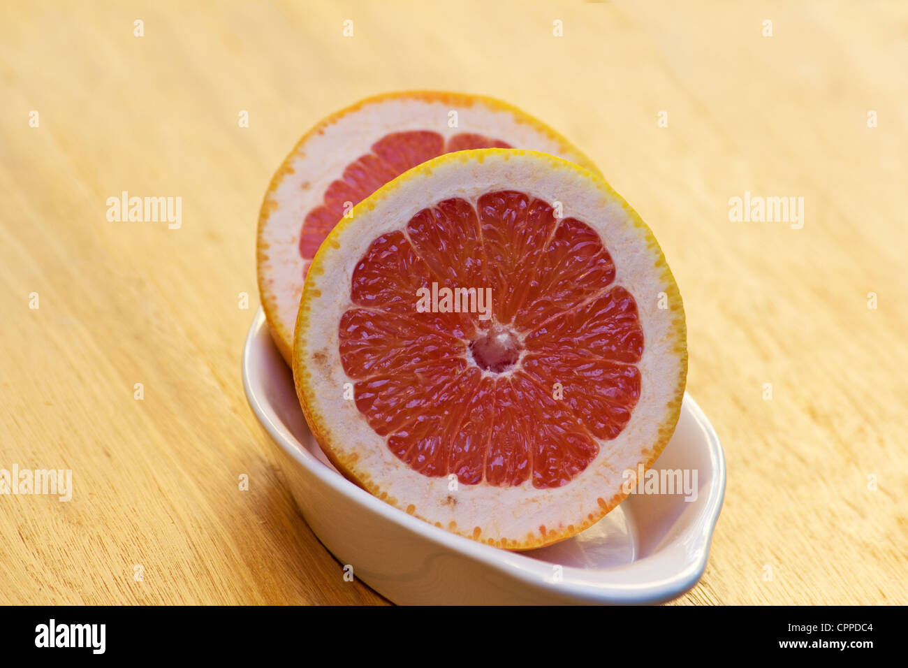 Close-up of grapefruit halves Stock Photo - Alamy