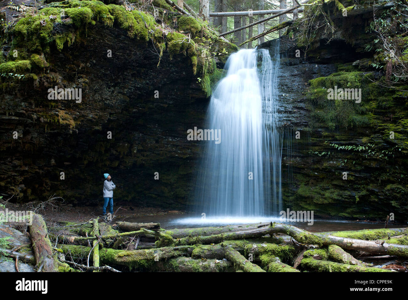 A woman is viewing the sceninc Shadow Falls Stock Photo - Alamy