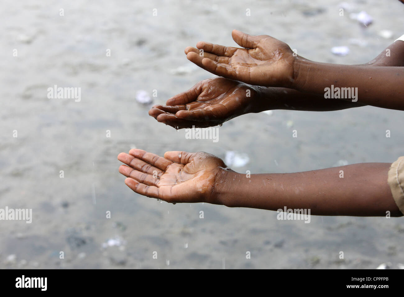 Africa child rain hi-res stock photography and images - Alamy