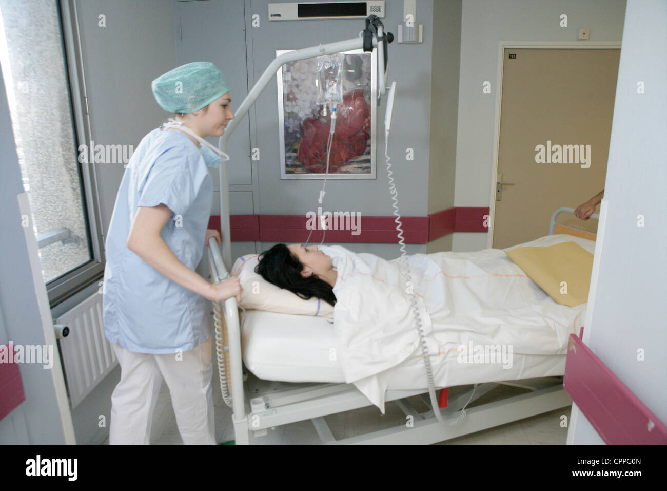WOMAN IN HOSPITAL Stock Photo - Alamy