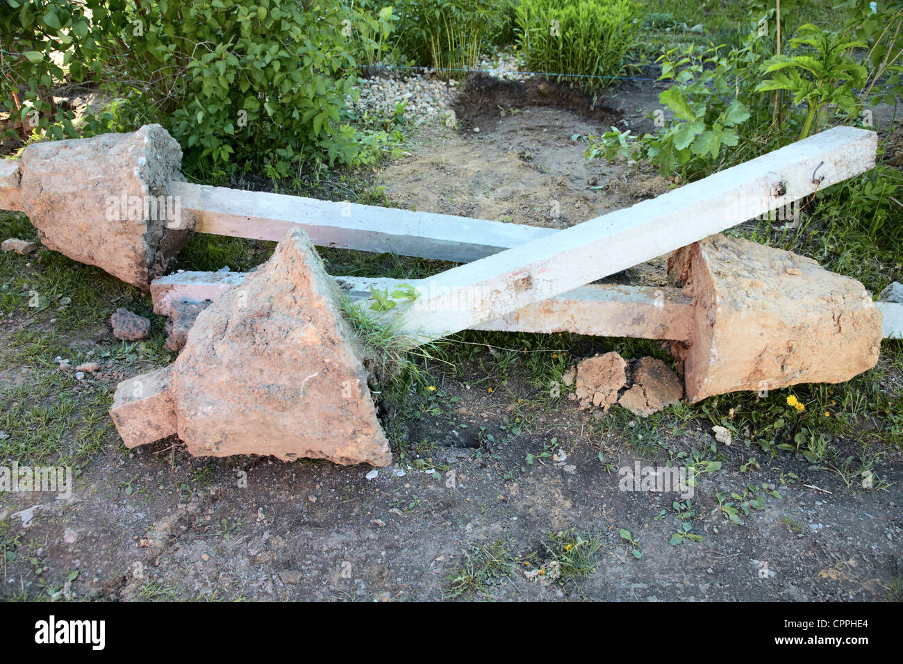 Old concrete columns dug from a ground Stock Photo - Alamy