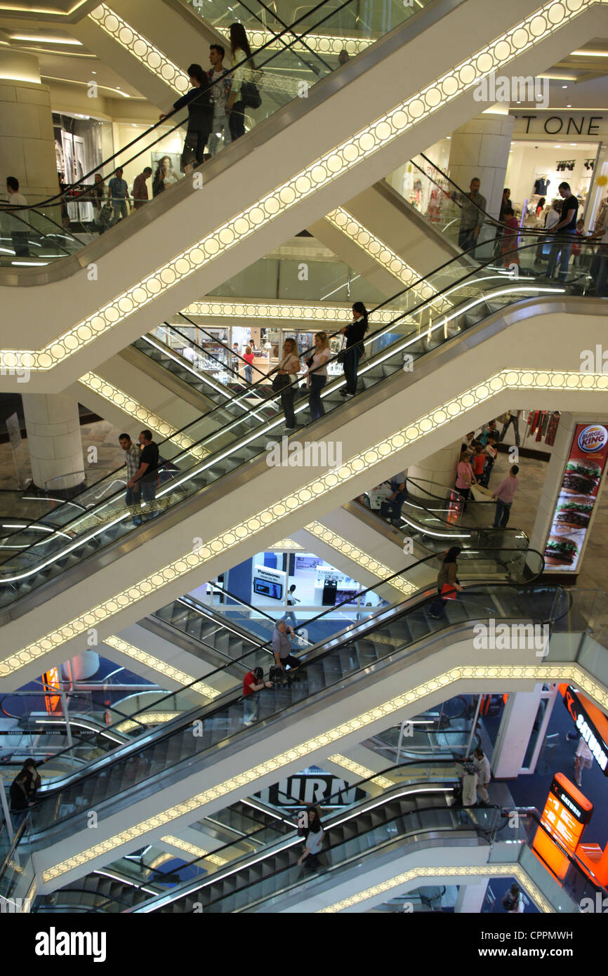 Escalators people department store hi-res stock photography and images ...