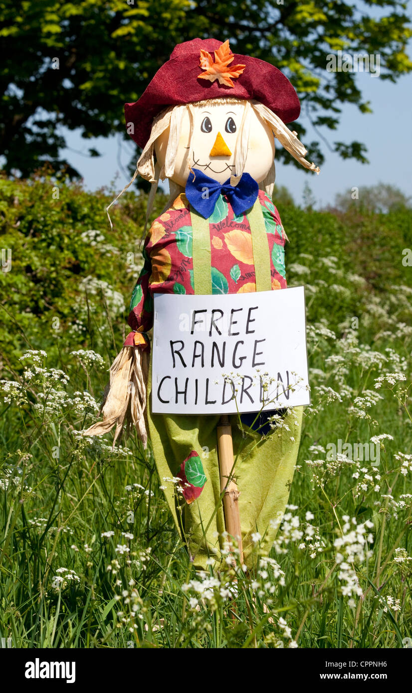 Warning sign home made scarecrow traffic sign at side of road free ...