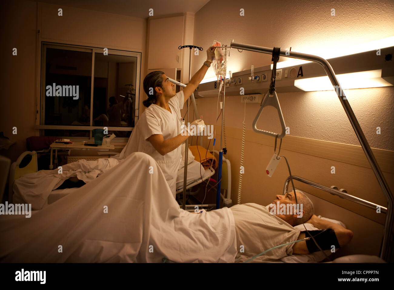 MAN RECEIVING BLOOD TRANSFUSION Stock Photo - Alamy