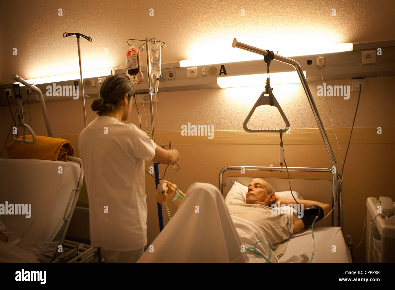 MAN RECEIVING BLOOD TRANSFUSION Stock Photo - Alamy