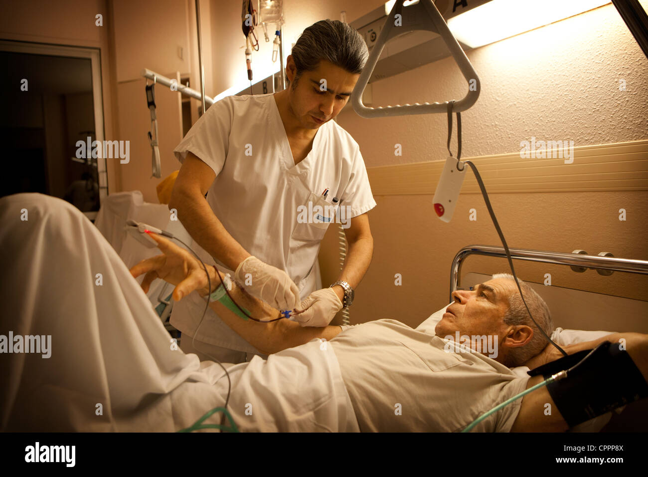 MAN RECEIVING BLOOD TRANSFUSION Stock Photo - Alamy