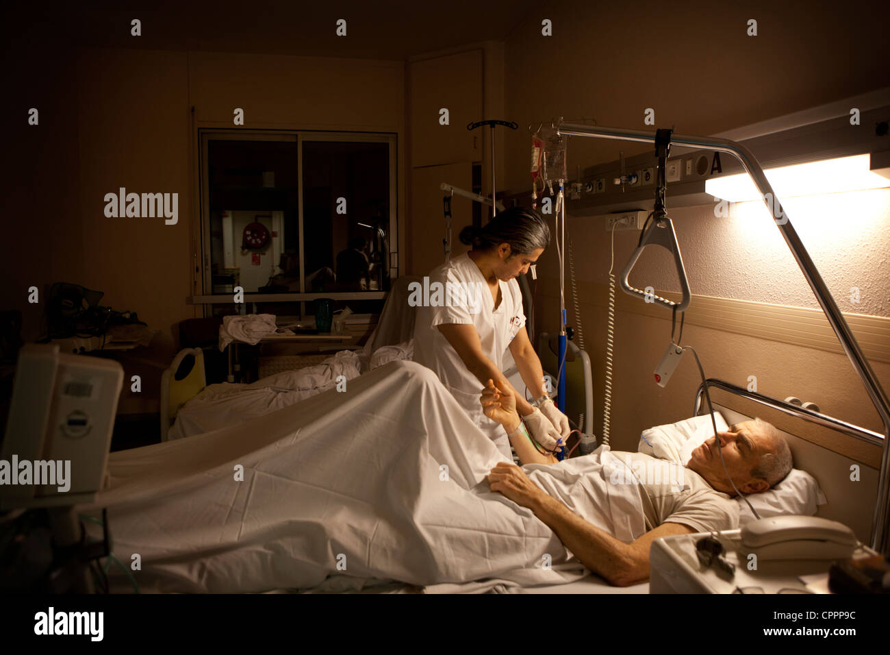 MAN RECEIVING BLOOD TRANSFUSION Stock Photo - Alamy