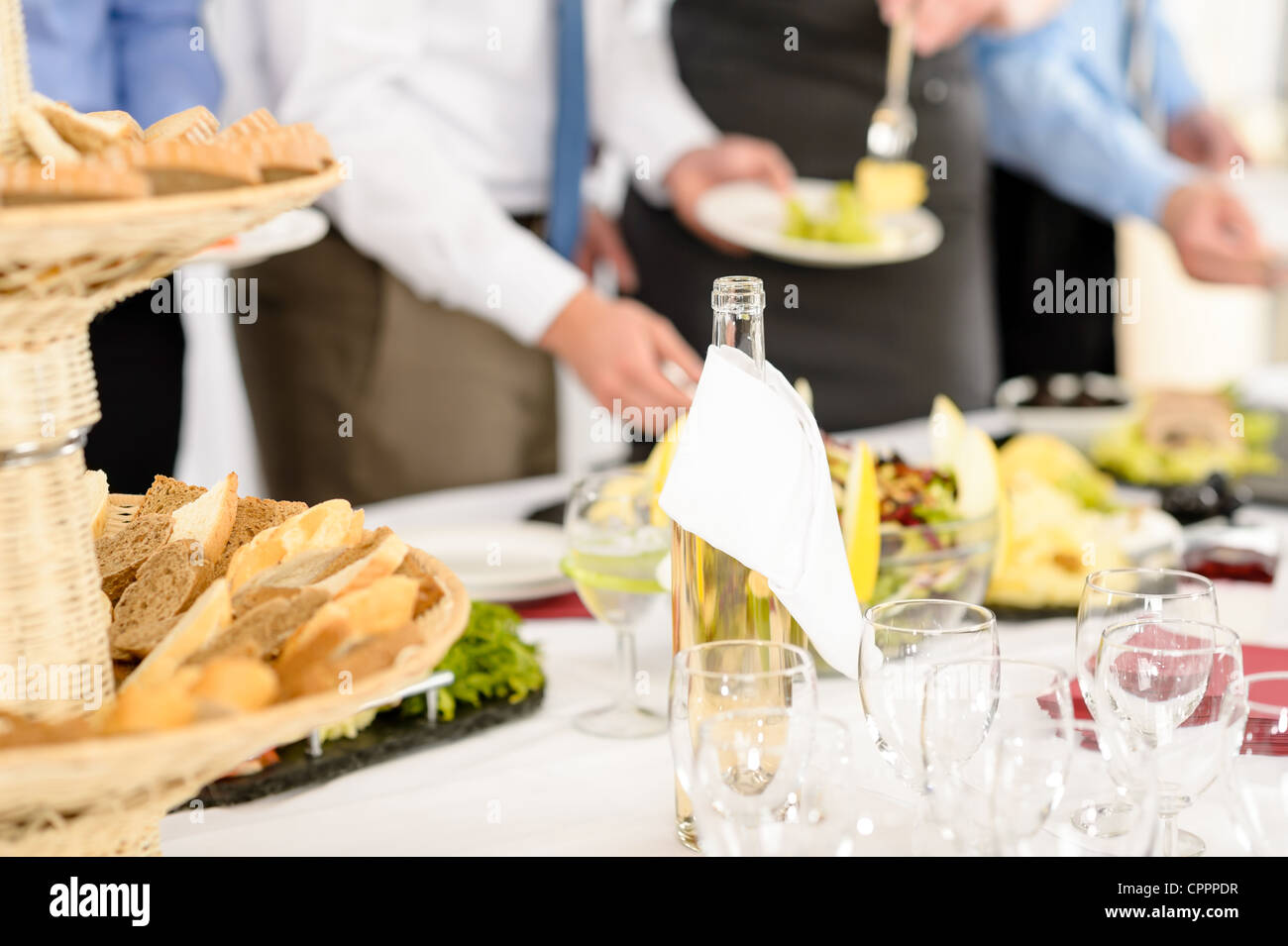 People serving themselves buffet hi-res stock photography and images ...