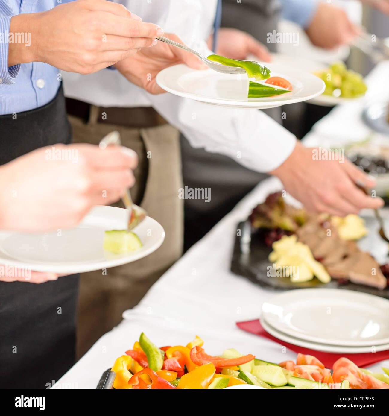 Business catering people take buffet food during company event Stock ...