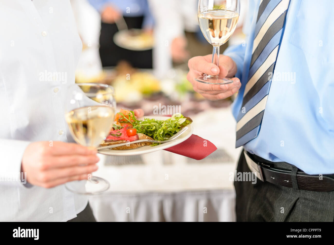 Refreshments at business meeting close-up appetizer plate and wine ...
