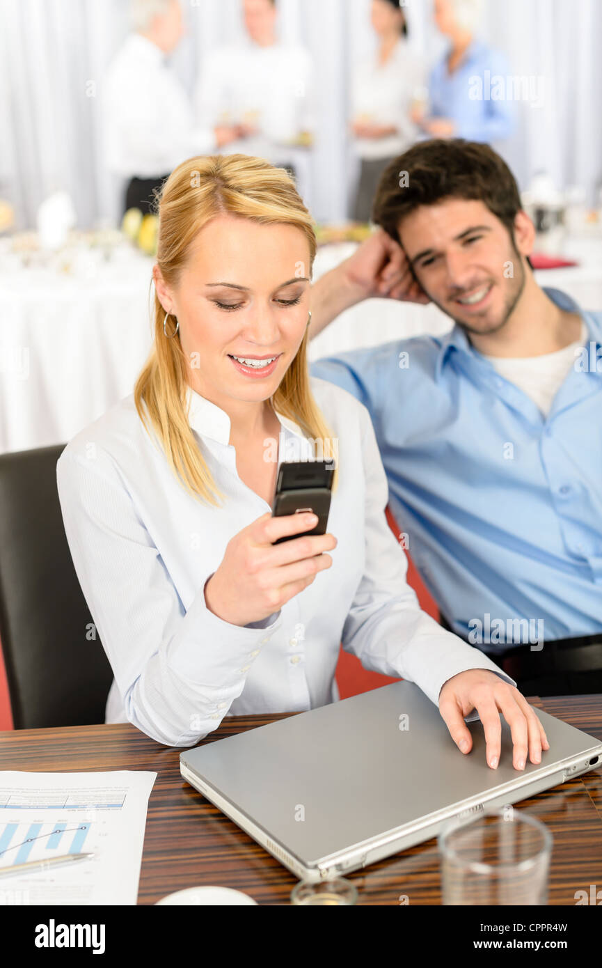 Young business woman call phone during company buffet lunch Stock Photo ...