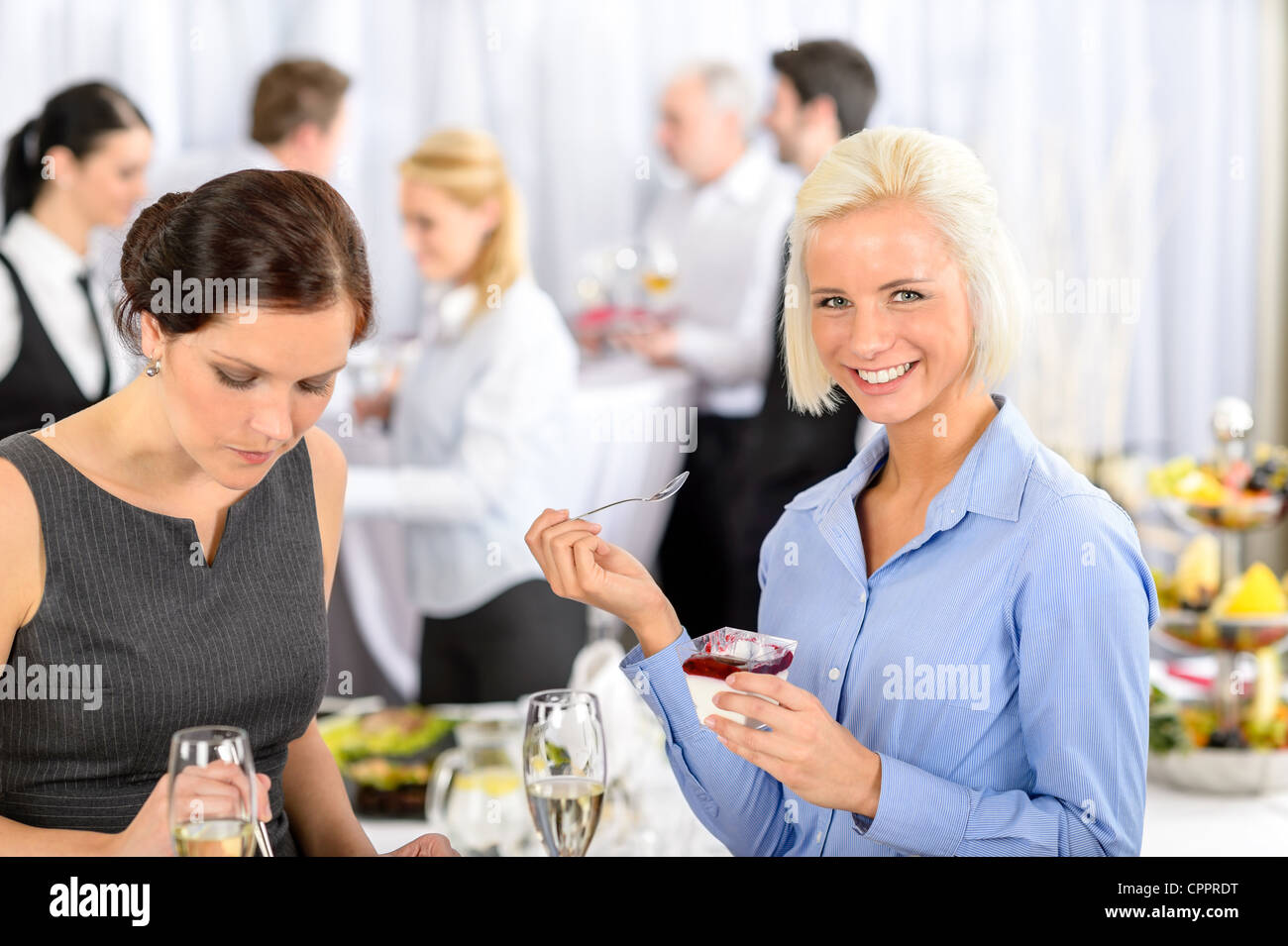 Business meeting buffet smiling woman eat dessert formal company event ...