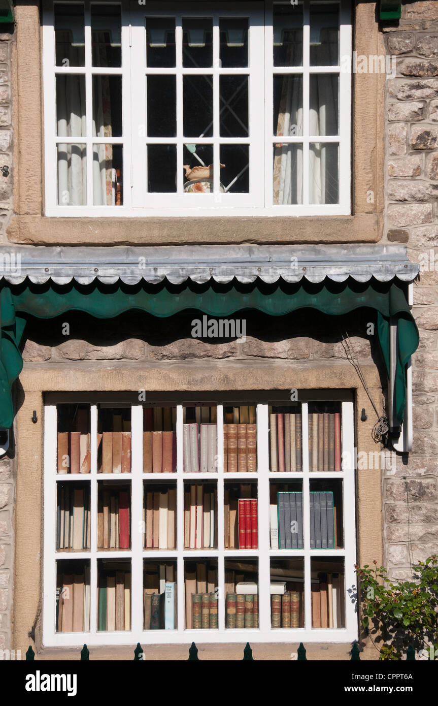 Books in picturesque window in Castleton, Derbyshire, UK Stock Photo ...
