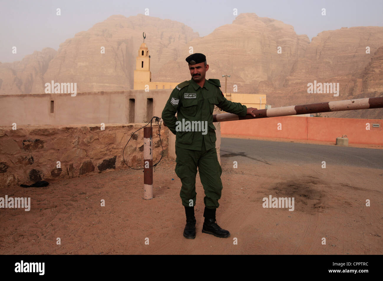 Jordanian soldier stands guard at the entrance to Rum village in Wadi ...