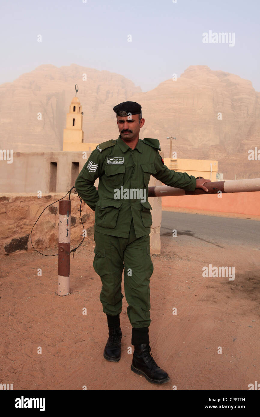 Jordanian soldier stands guard at the entrance to Rum village in Wadi ...