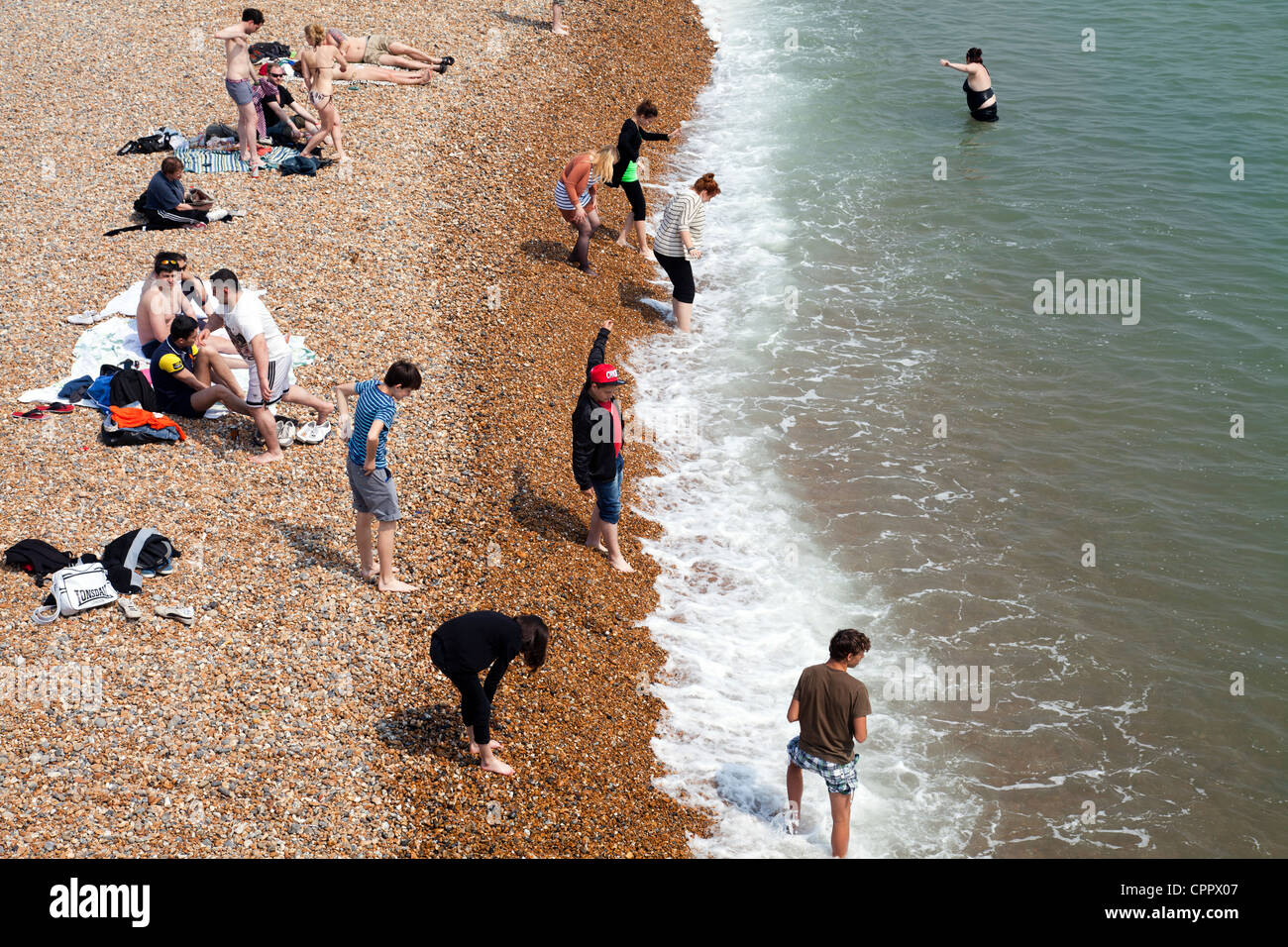 Brighton Beach Beachgoers in East Sussex - UK Stock Photo - Alamy