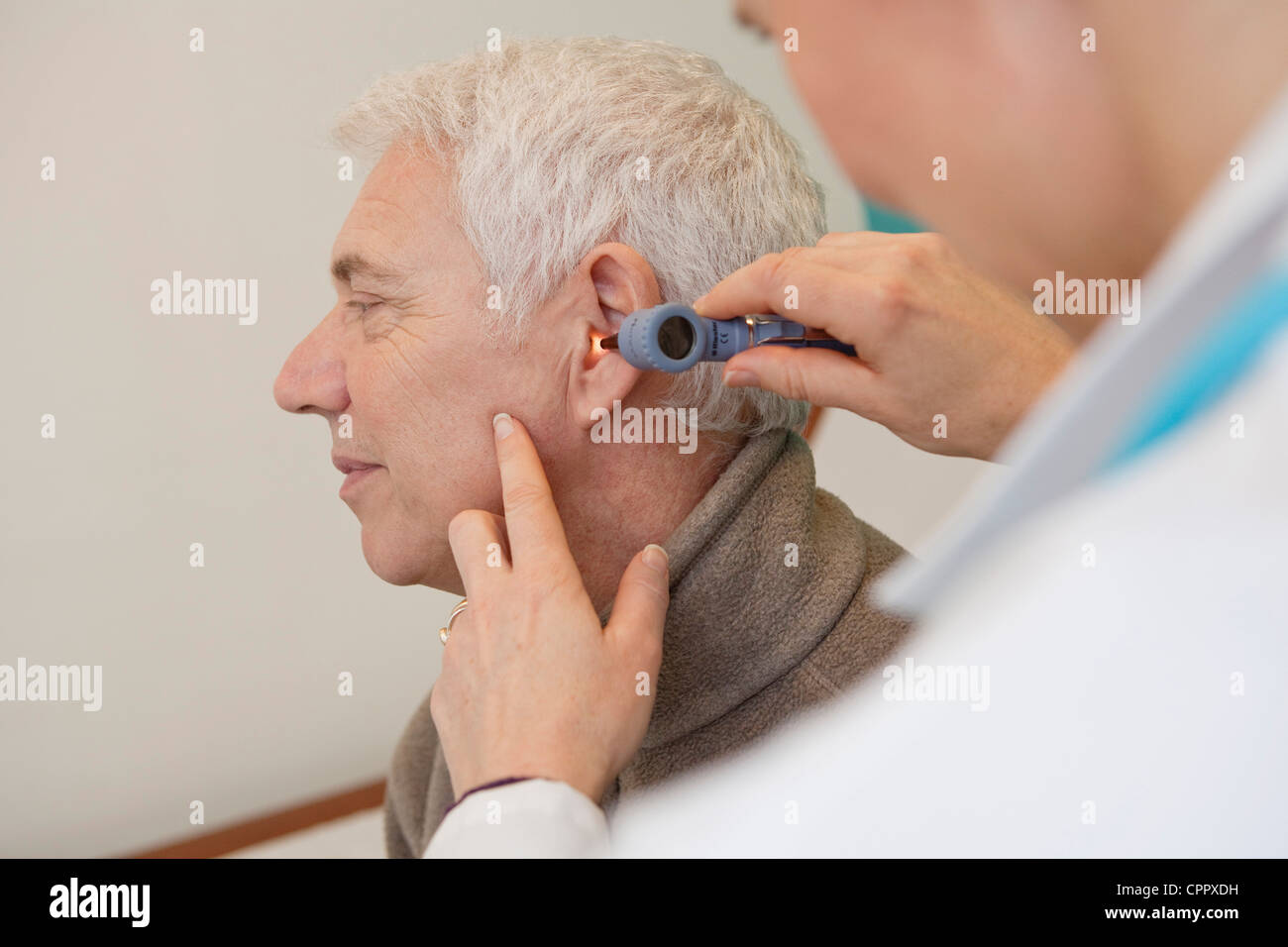 Older persons ear hi-res stock photography and images - Alamy