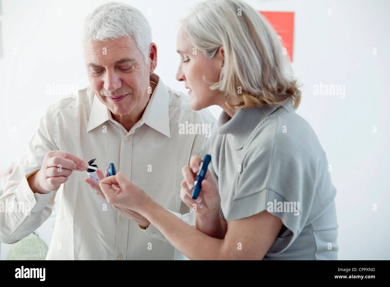 TEST FOR DIABETES ELDERLY PERSON Stock Photo - Alamy