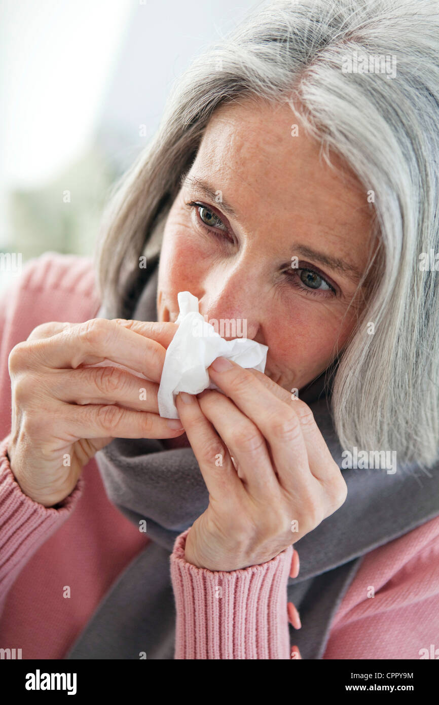 ELDERLY PERSON WITH RHINITIS Stock Photo - Alamy