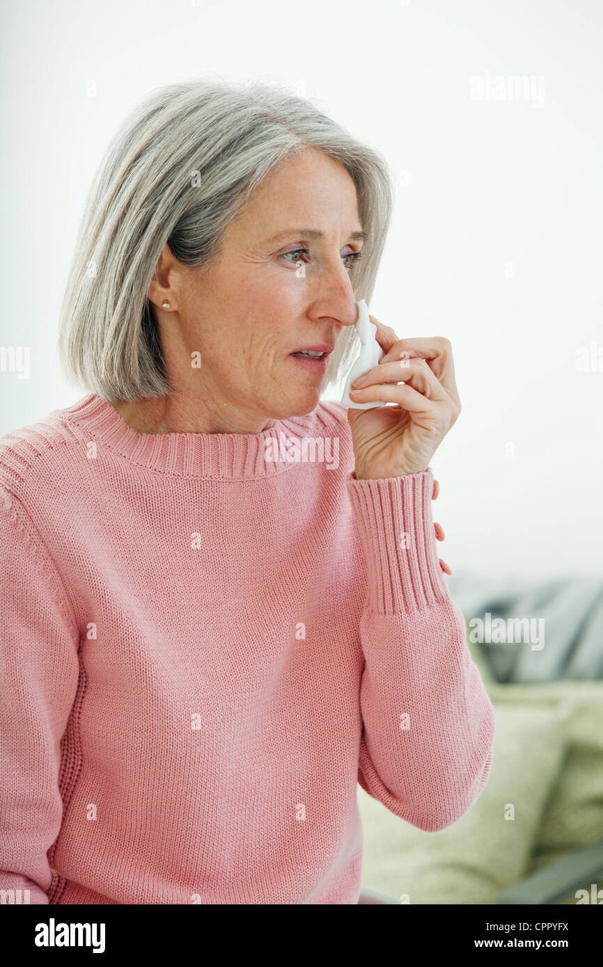 ELDERLY PERSON WITH RHINITIS Stock Photo - Alamy