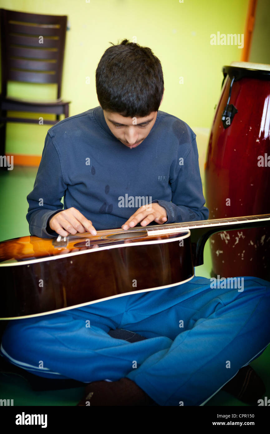 Autistic guitar hi-res stock photography and images - Alamy