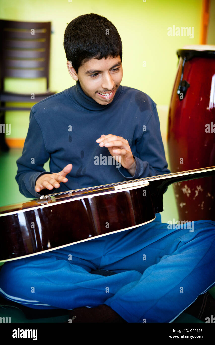 Autistic guitar hi-res stock photography and images - Alamy