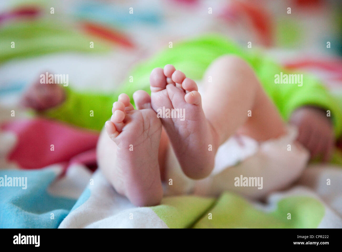 Month old baby girls feet hi-res stock photography and images - Alamy
