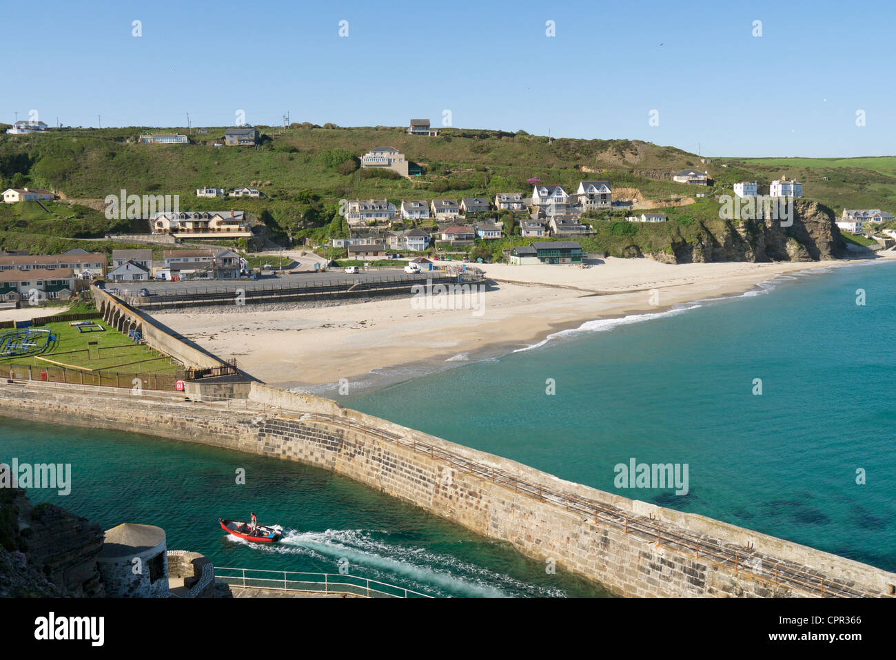Portreath seaside village beach and pier from the cliff edge on ...