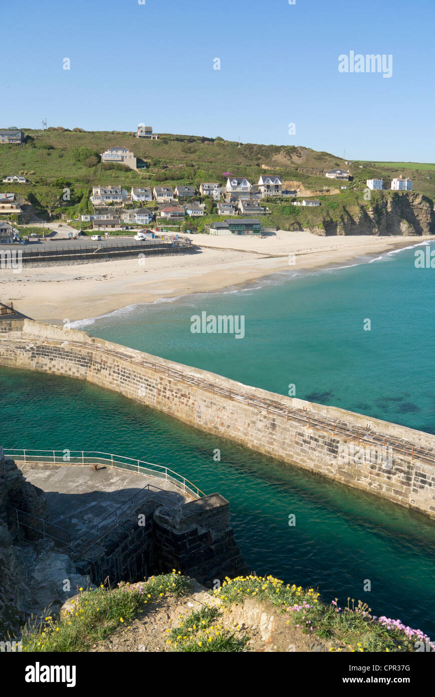 Portreath seaside village beach and pier from the cliff edge on ...