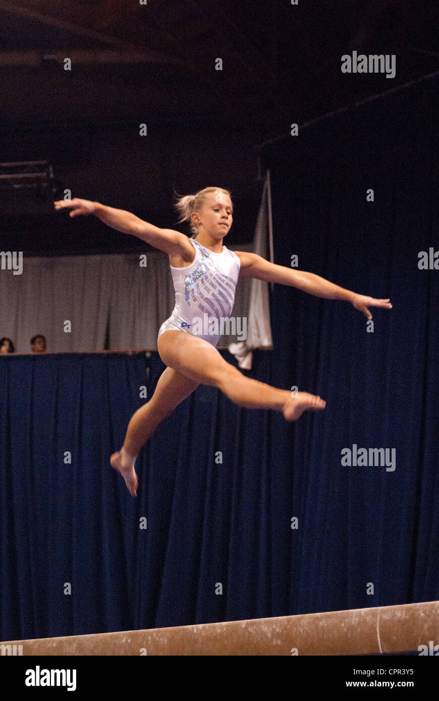 McKenzie Wofford flies high aboe the balance beam practice at the UIC ...