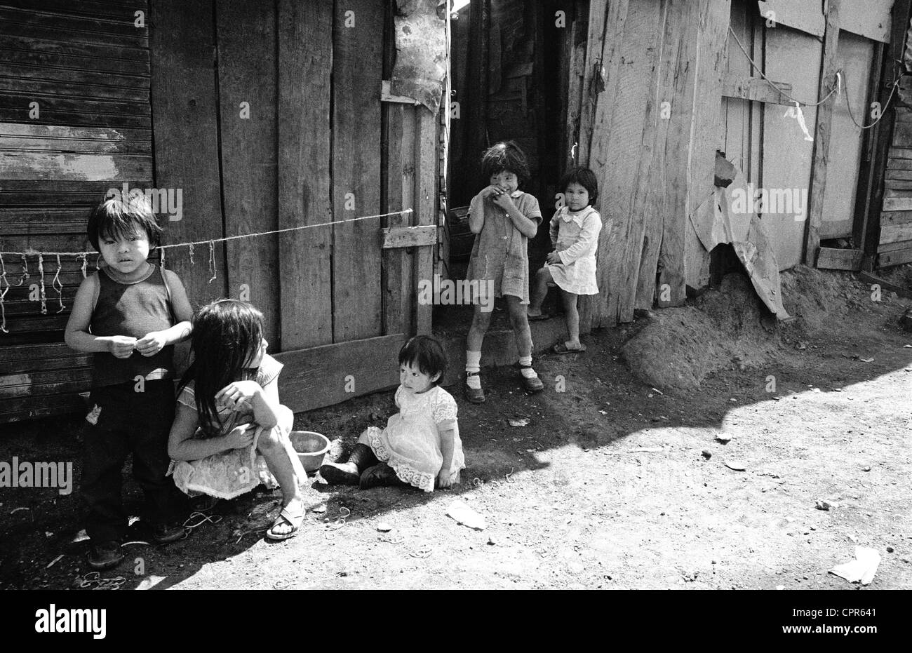 Young kids playing in a slum in Guatemala City Stock Photo - Alamy