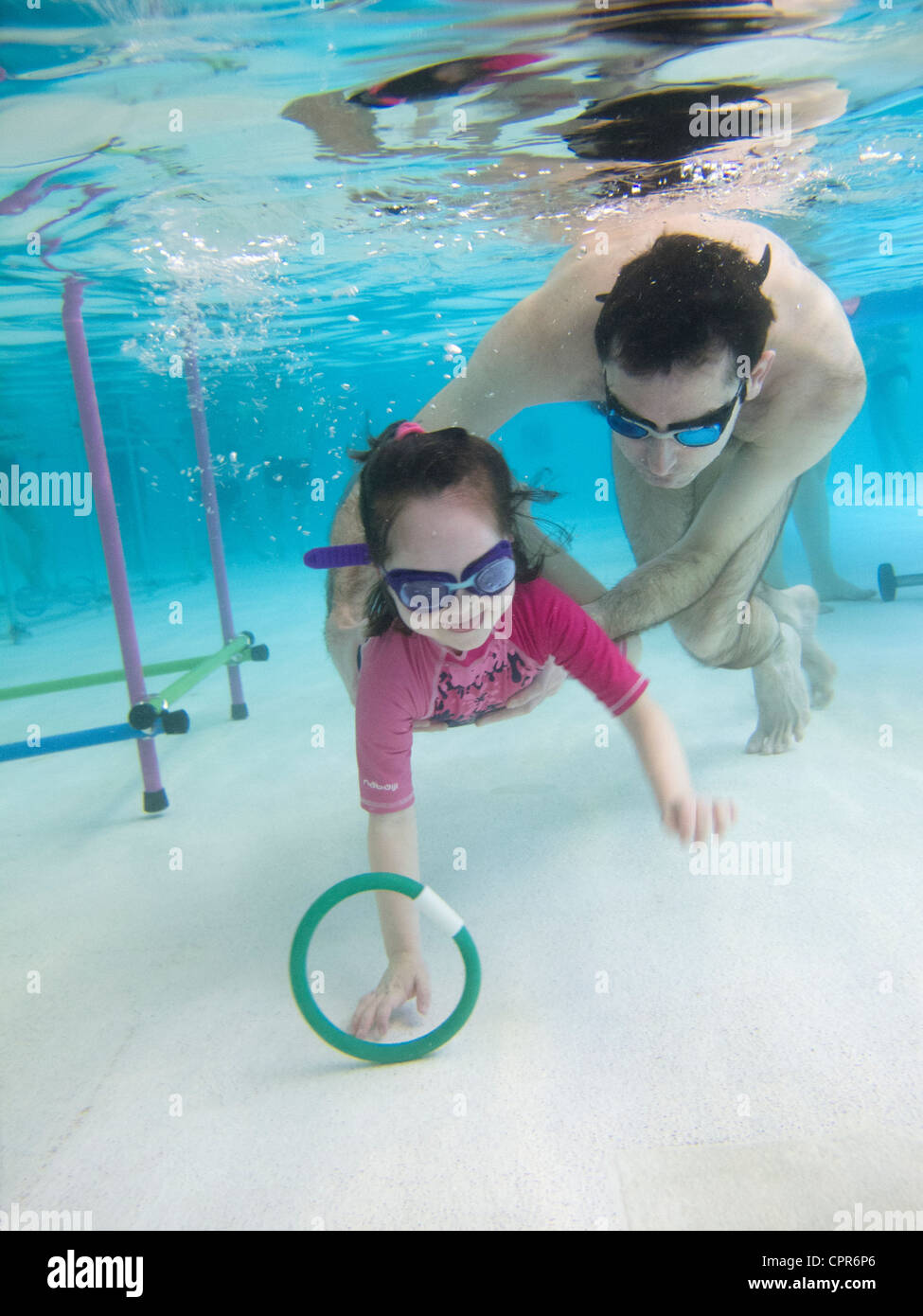 Swimming underwater baby pool hi-res stock photography and images - Alamy