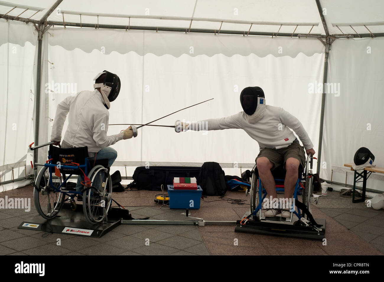 Paris, France - Two people practicing fencing for disabled Stock Photo ...