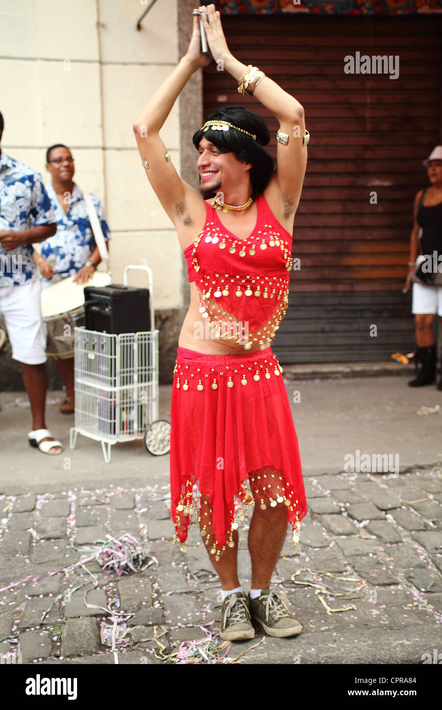 Man dancing and celebrating Carnival on the streets of Rio de Janeiro ...
