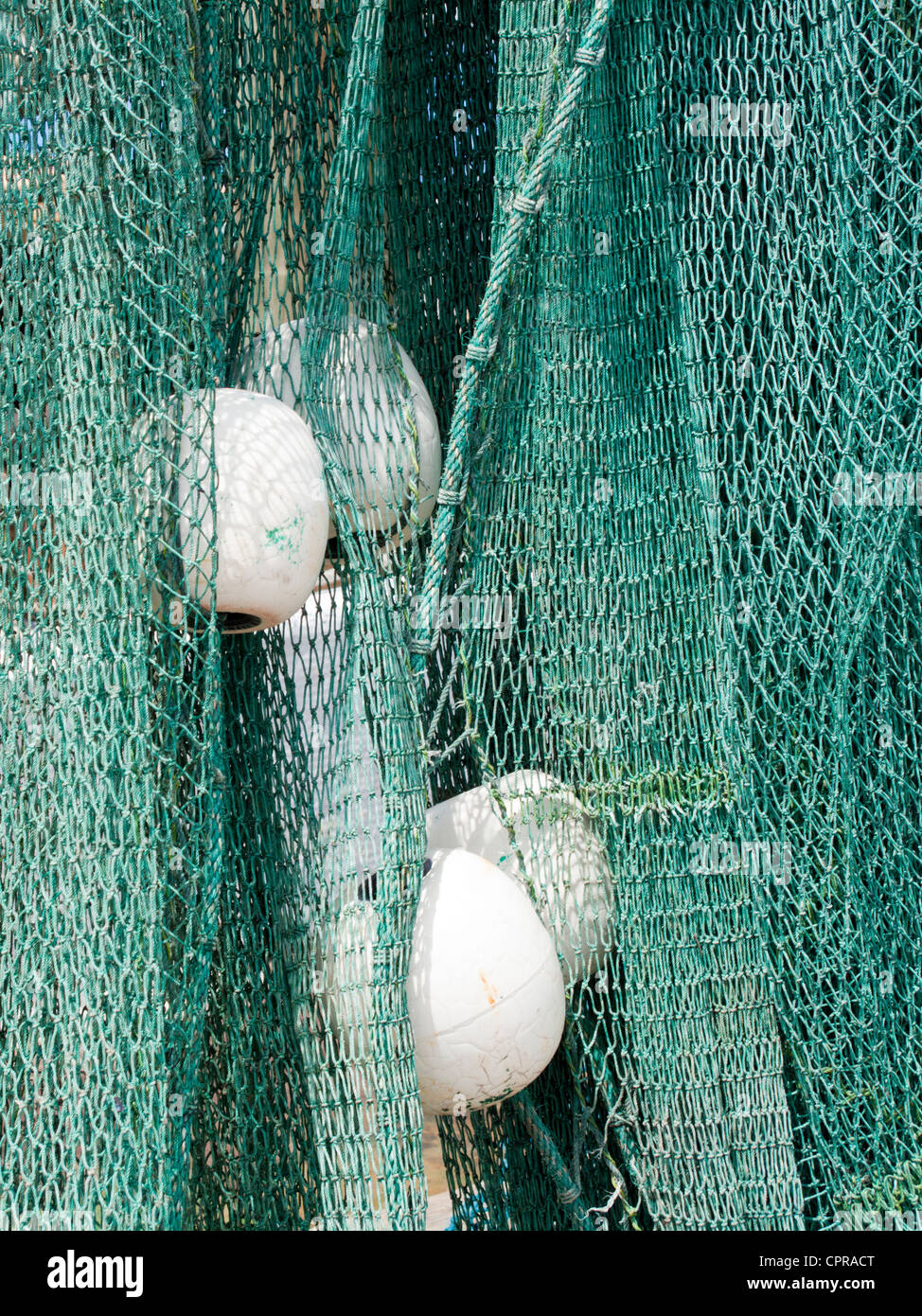 fishing nets hanging Stock Photo - Alamy