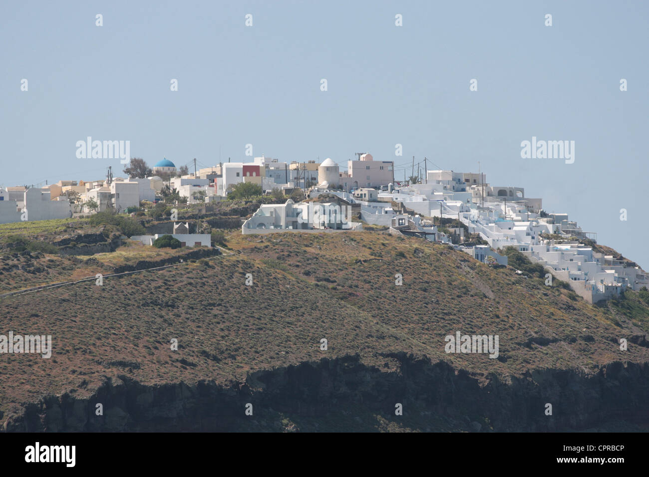 Imerovigli on Santorini, with steep cliff edge below the buildings ...