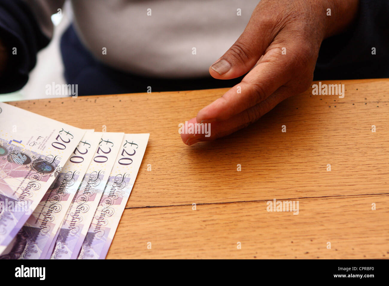 Elderly money sterling hi-res stock photography and images - Alamy