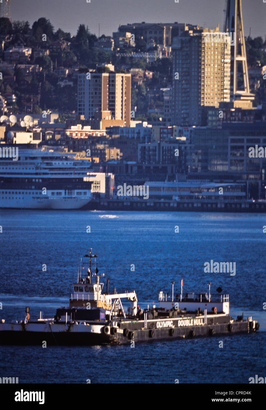 Space Needle tower, Seattle, Washington state shipping port . Tug boats ...