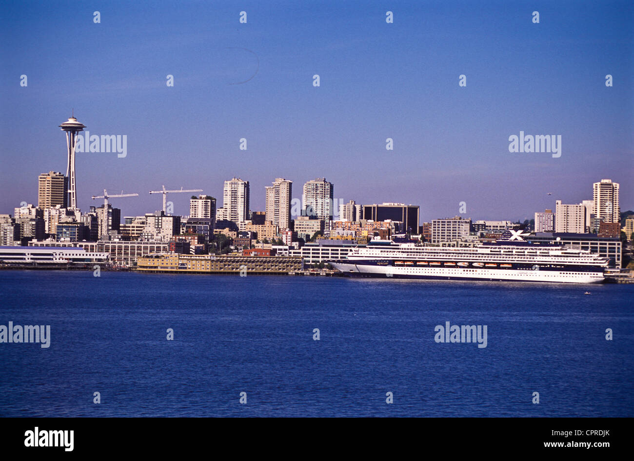 Space Needle tower, Seattle, Washington state shipping port . Tug boats ...