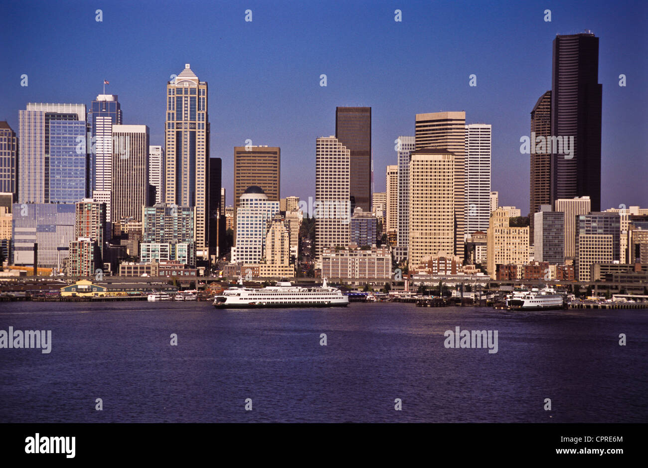 Space Needle tower, Seattle, Washington state shipping port . Tug boats ...