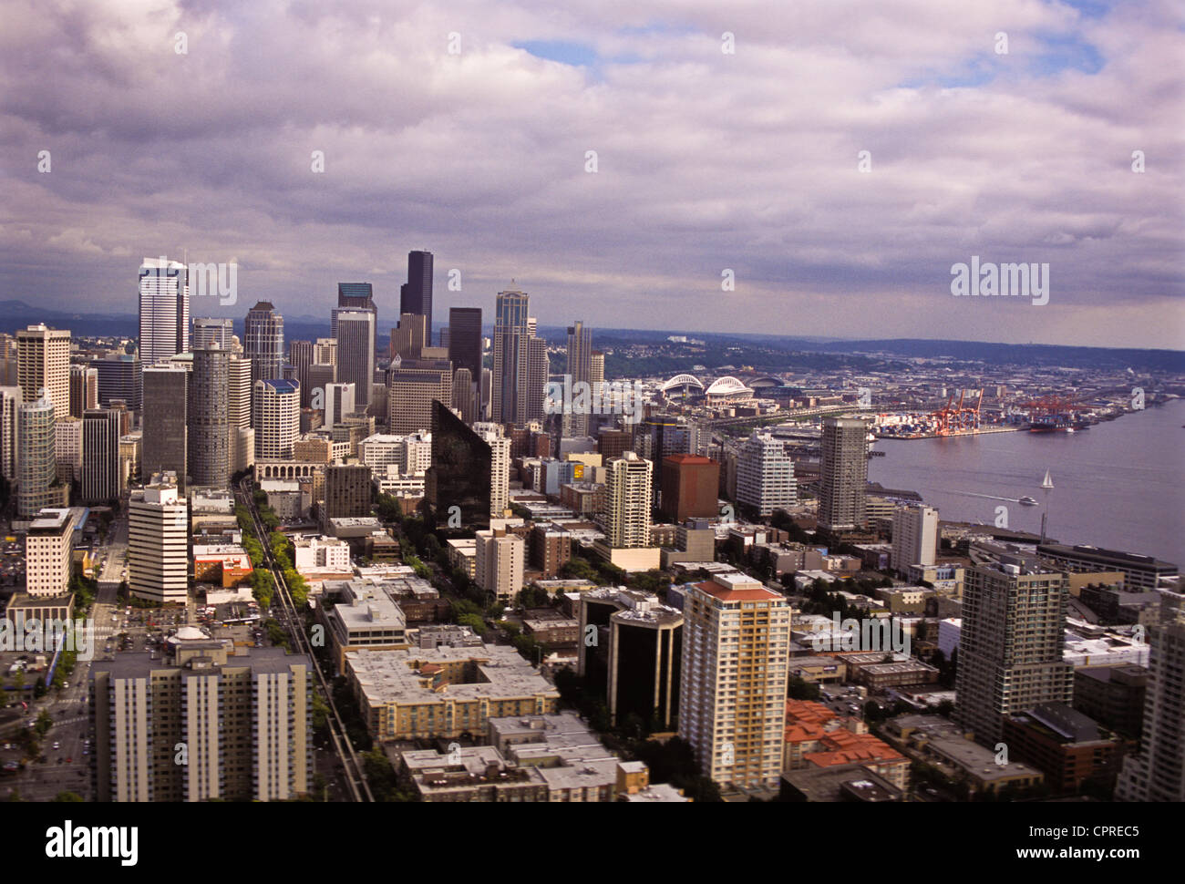 Space Needle tower, Seattle, Washington state shipping port . Tug boats ...