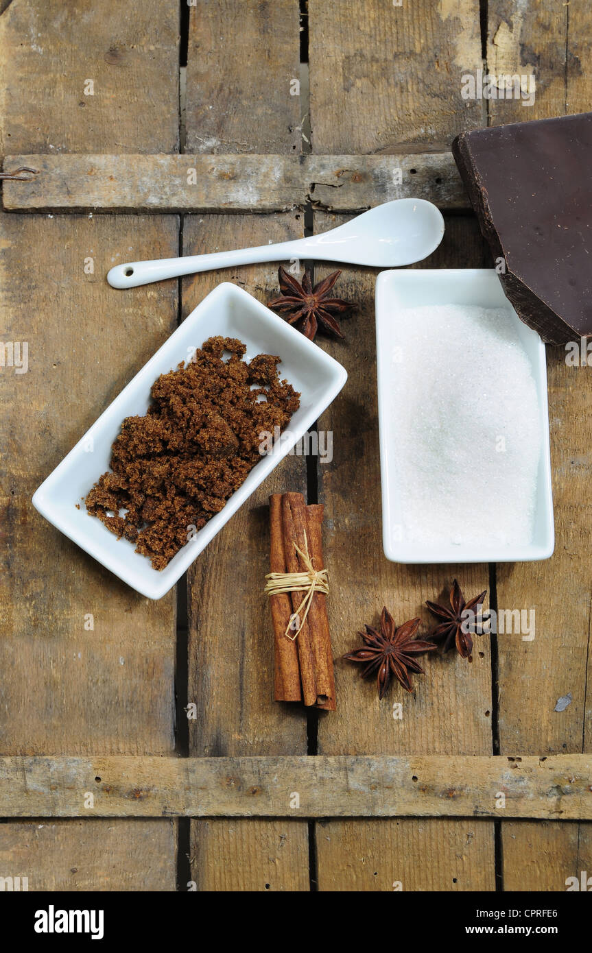 Sweet ingredients - white and brown sugar, chocolate, cinnamon and ...