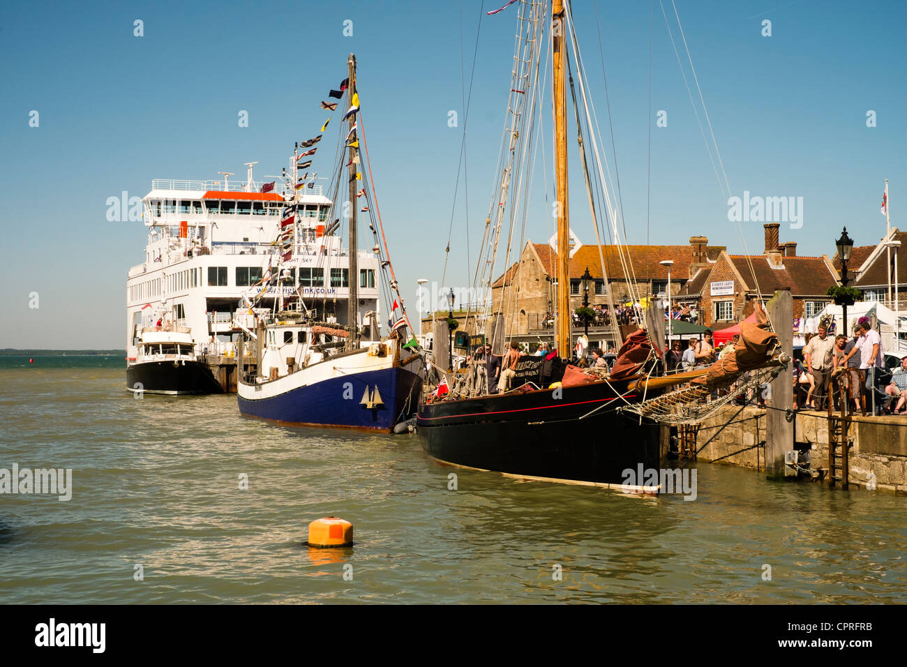 Vessels and revellers mix together on the quayside during the Old ...