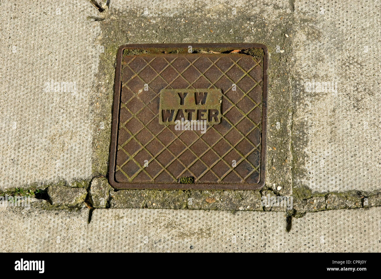 Close up of water main access point set in the pavement North Yorkshire ...