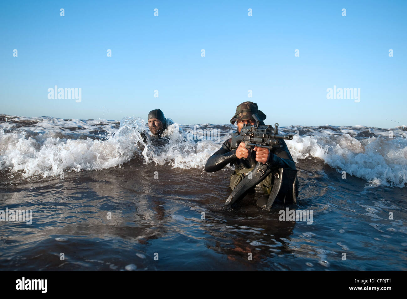 US Navy SEALs during water training at sunrise October 21, 2009 in ...